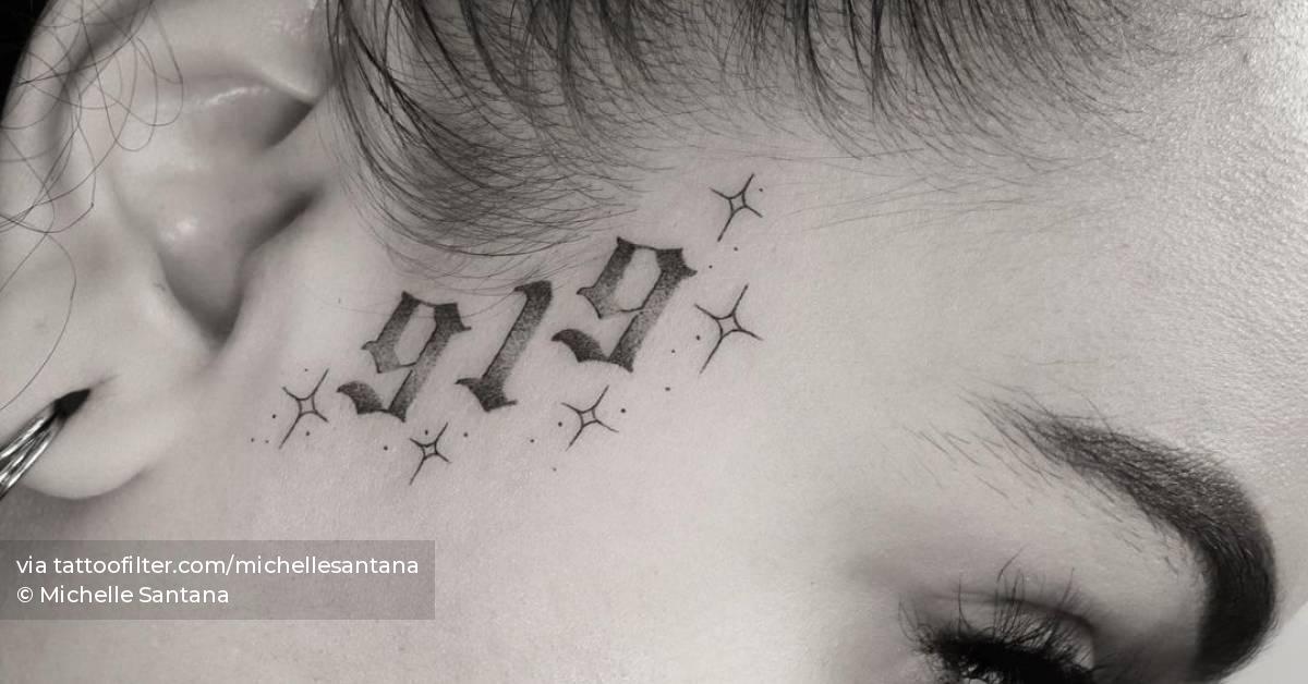 "919" tattooed on the face.