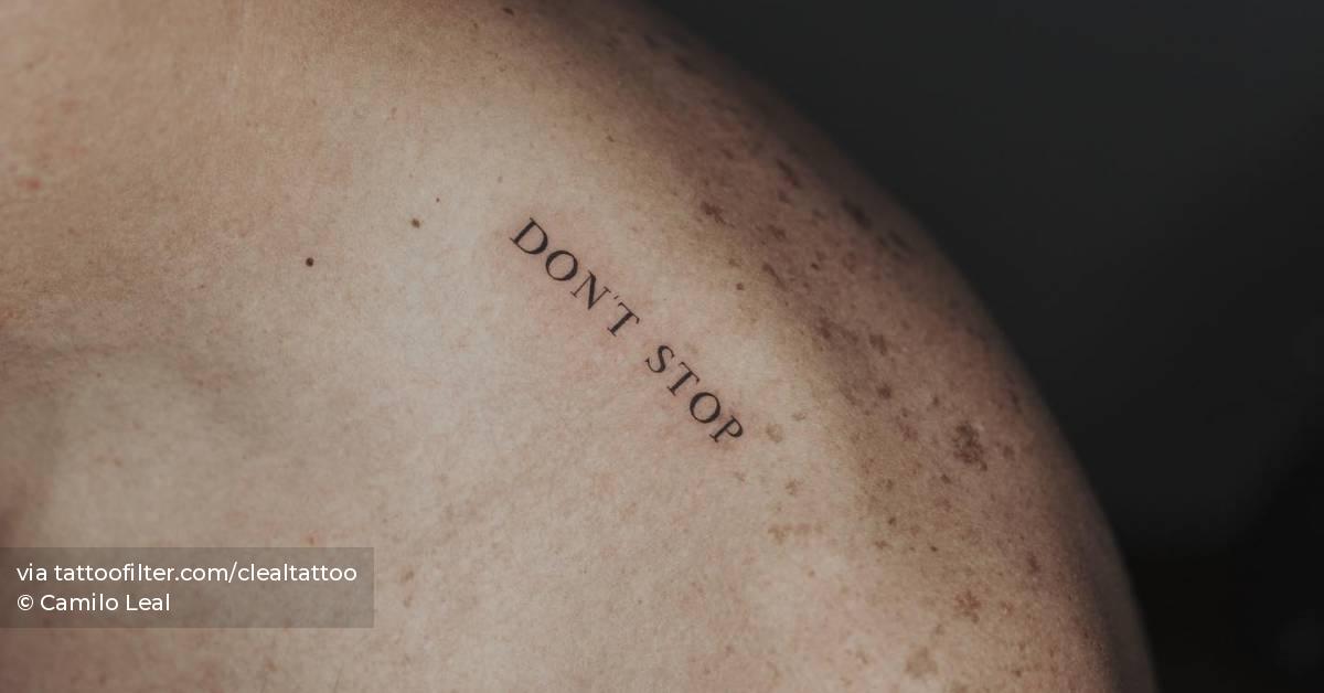 Tattoo that says don't stop placed on the top of