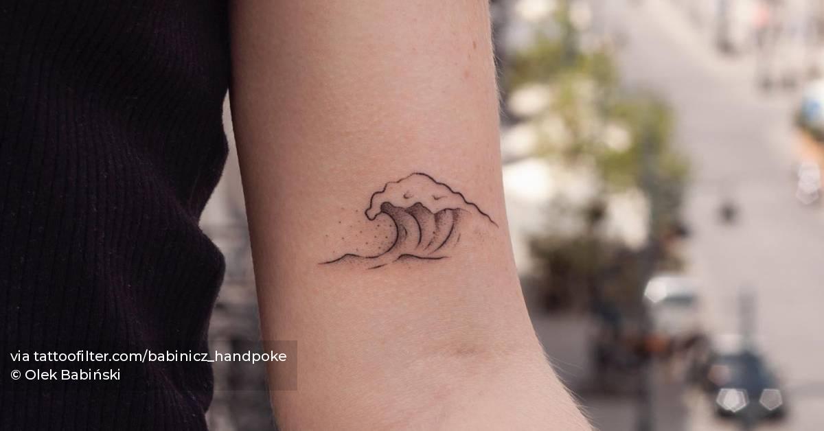 Wave tattoo done on the inner arm, hand poked.
