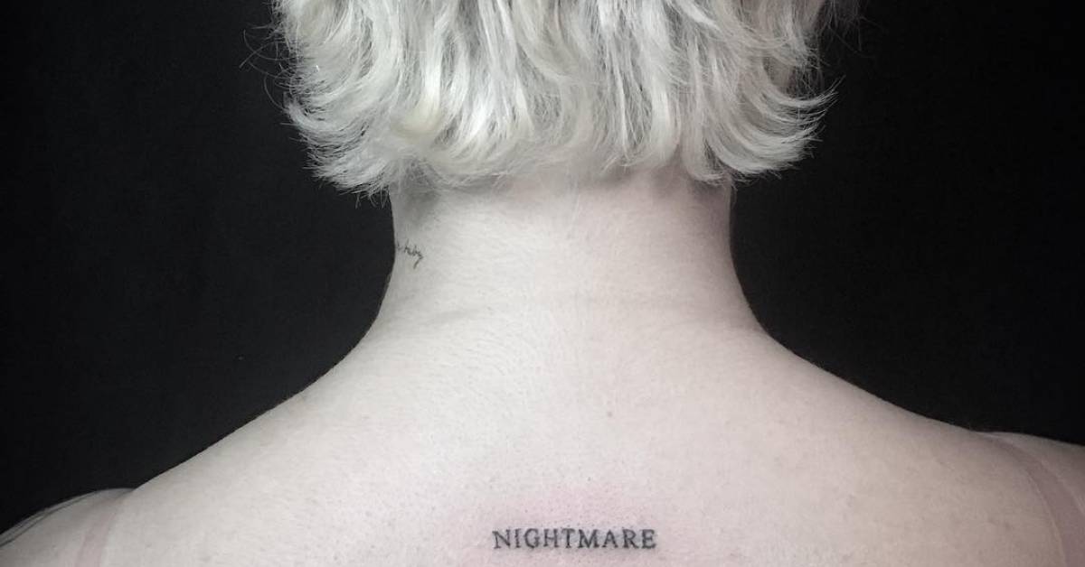 “Nightmare” tattoo on Halsey's upper back.