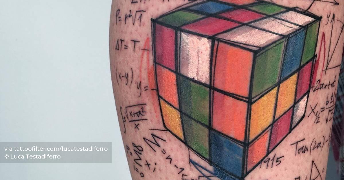 Rubik's cube tattoo done on the shin, sketchy style.