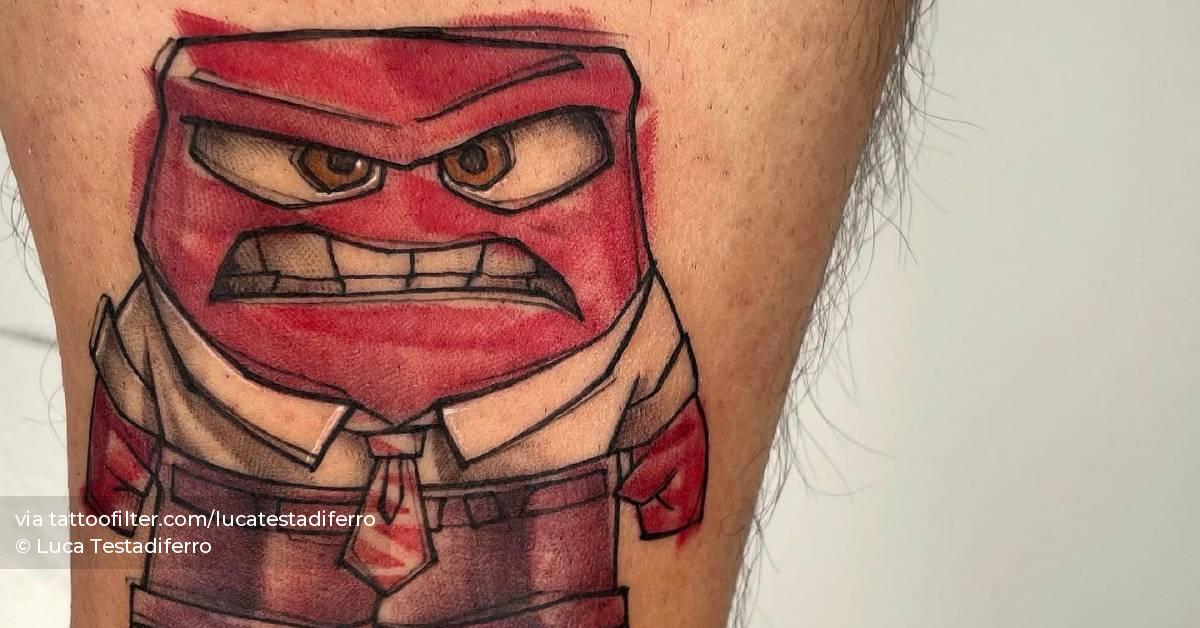 Inside Out's Anger tattooed on the shin.