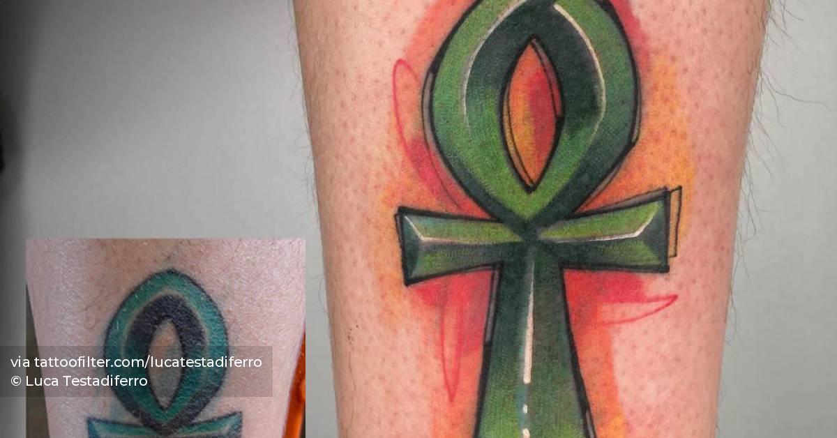 Touch up on old Ankh tattoo.