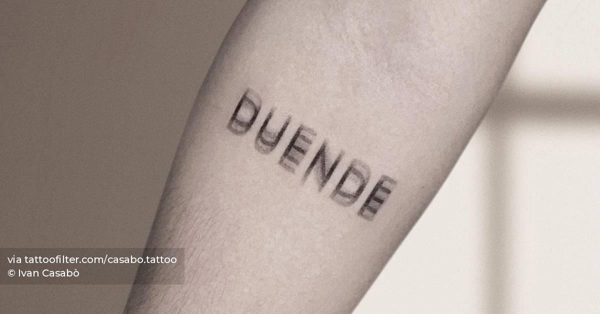 "Duende" anaglyph lettering tattoo located on the inner
