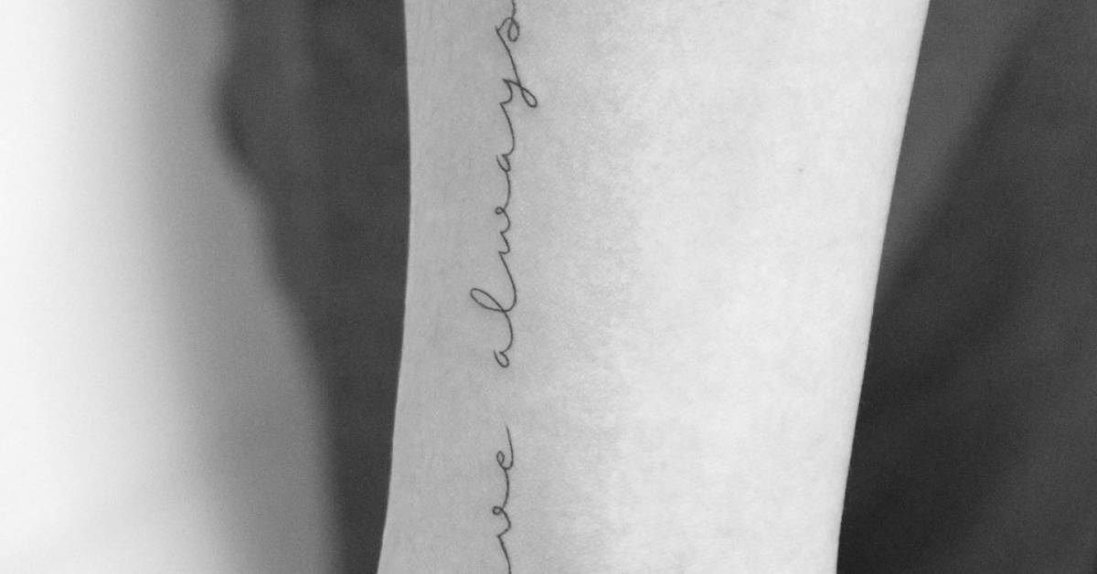 Lettering tattoo that says "love always" located on the