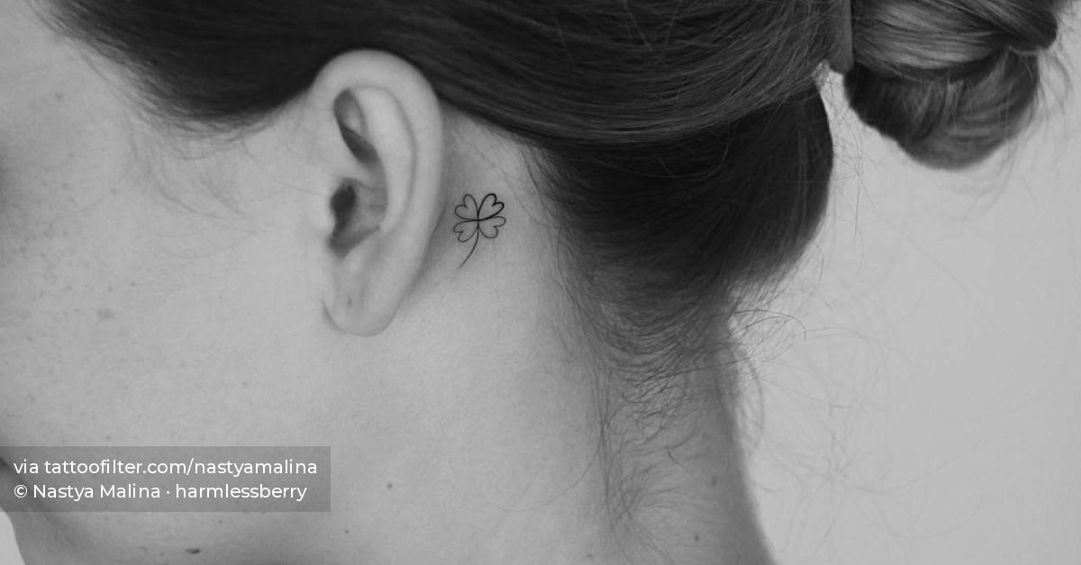Four leaf clover tattoo done behind the ear,