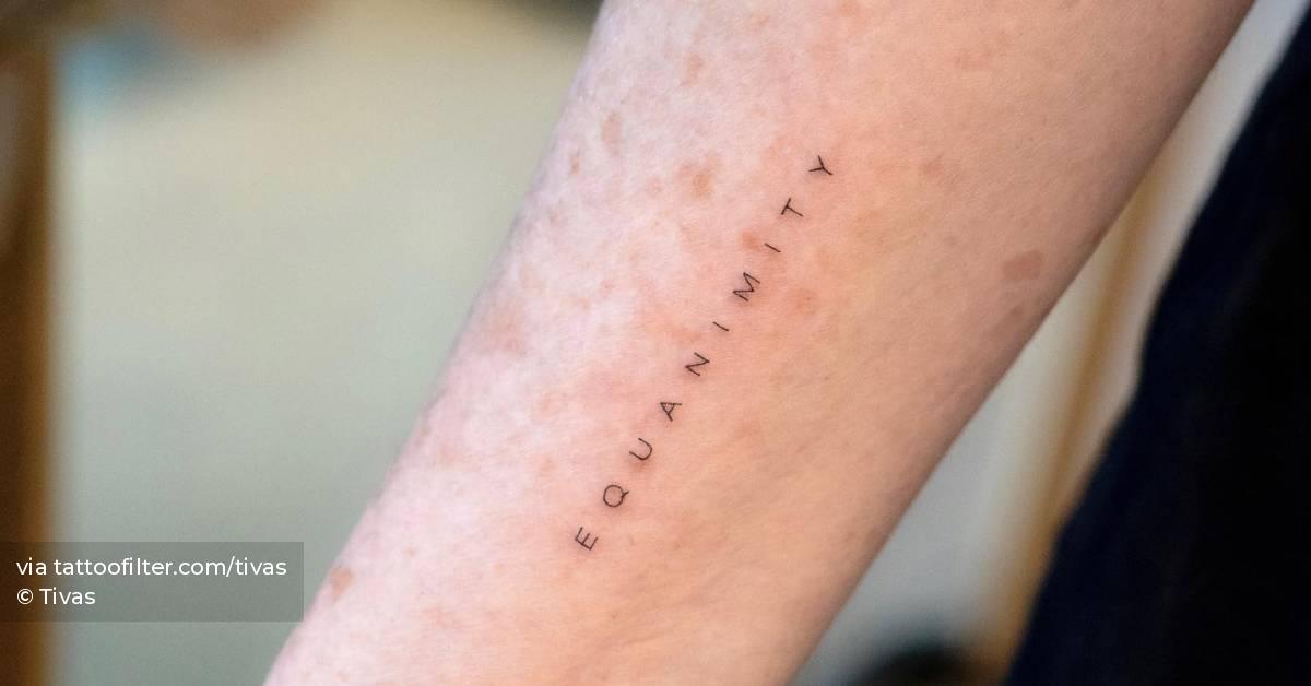 Tattoo of the word "equanimity" located on the inner