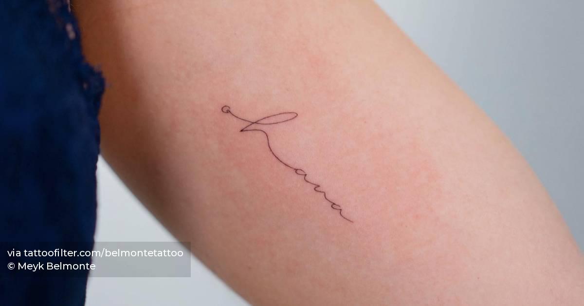 Word "ohana" tattooed on the inner arm.