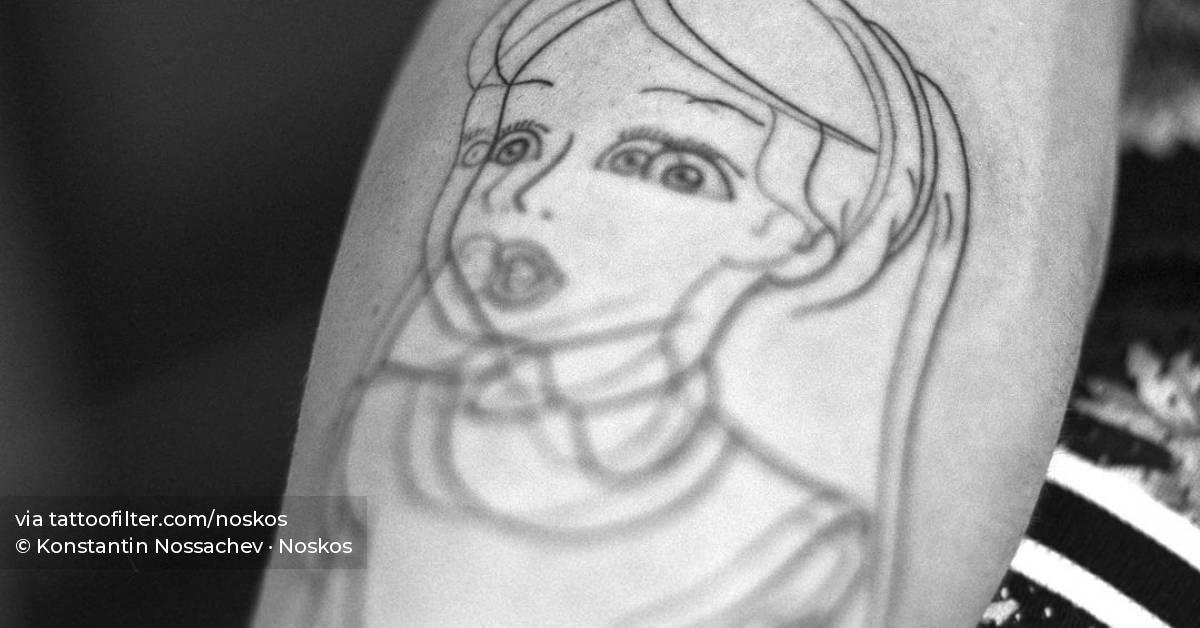 Disney's Alice anaglyph tattoo on the inner forearm