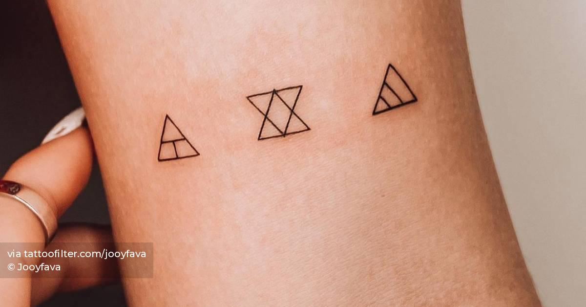 Create, Connect and Express glyphs tattooed on the