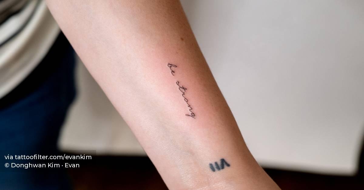 Lettering tattoo that says "be