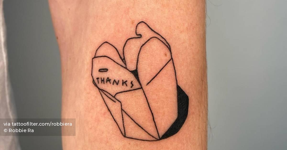 Chinese take away box hand poked on the forearm.