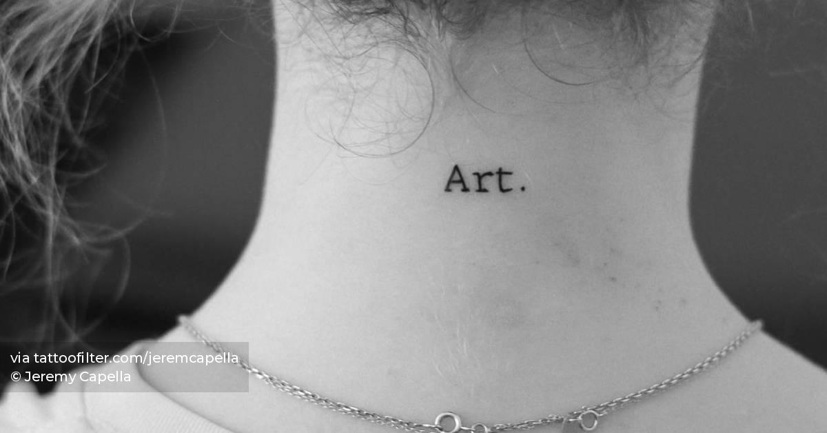 Hand poked word "art" tattooed on the back of the neck.