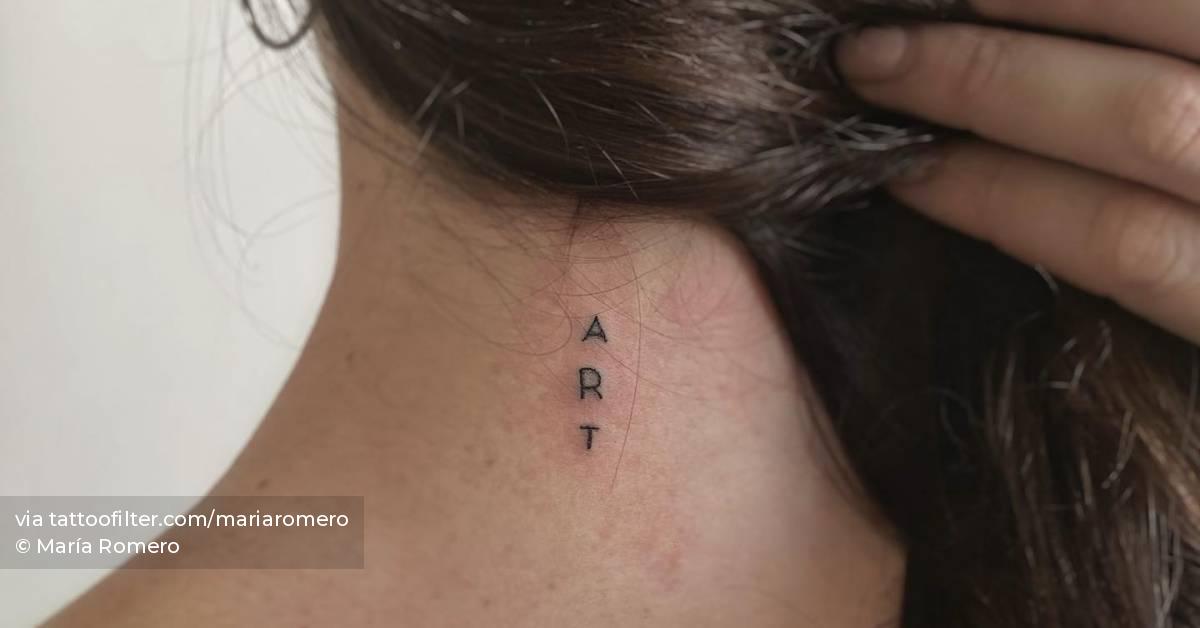 Word "art" tattooed on the back of the neck.