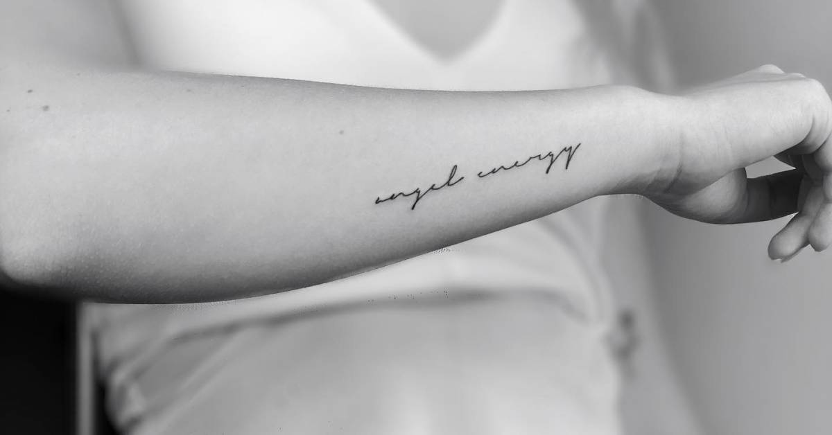 Tattoo Written angel Energy Located On The Wrist 