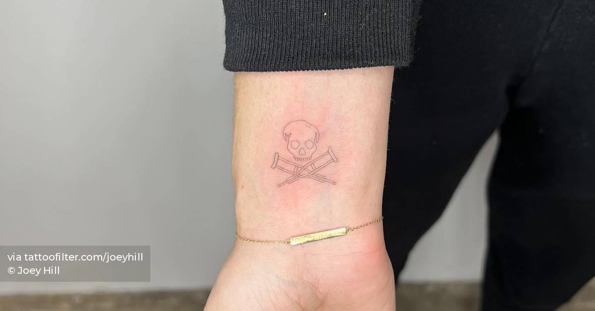 Fine line Jackass tattoo done on Rachel Wolfson's