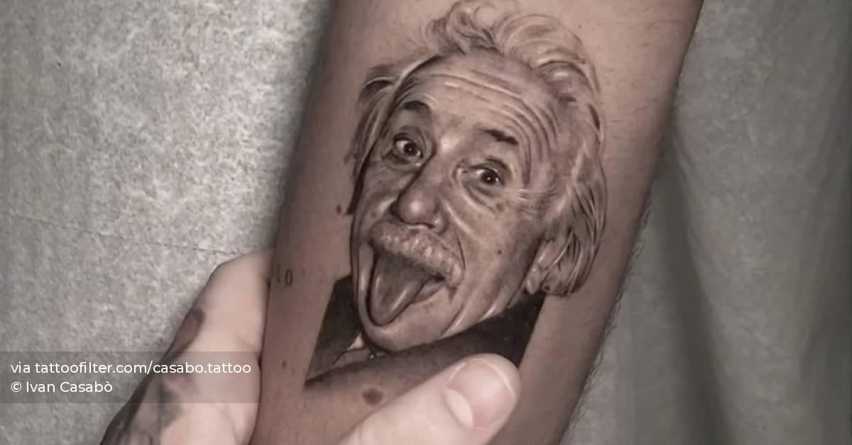 Micro-realistic Albert Einstein portrait tattoo located