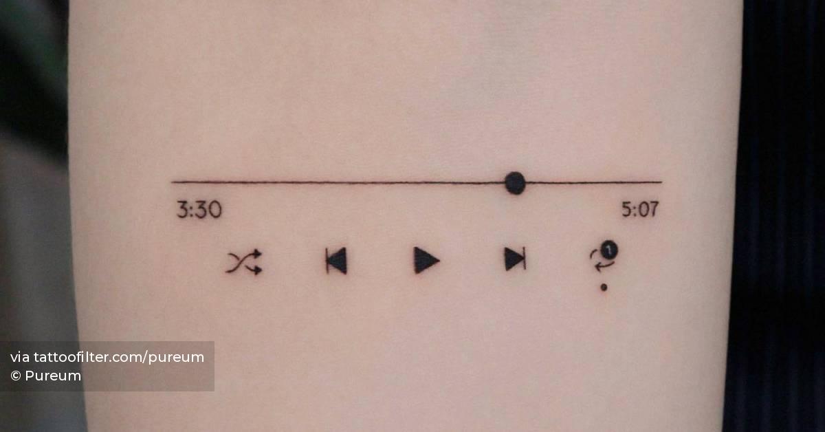 Music media controls tattoo located on the inner