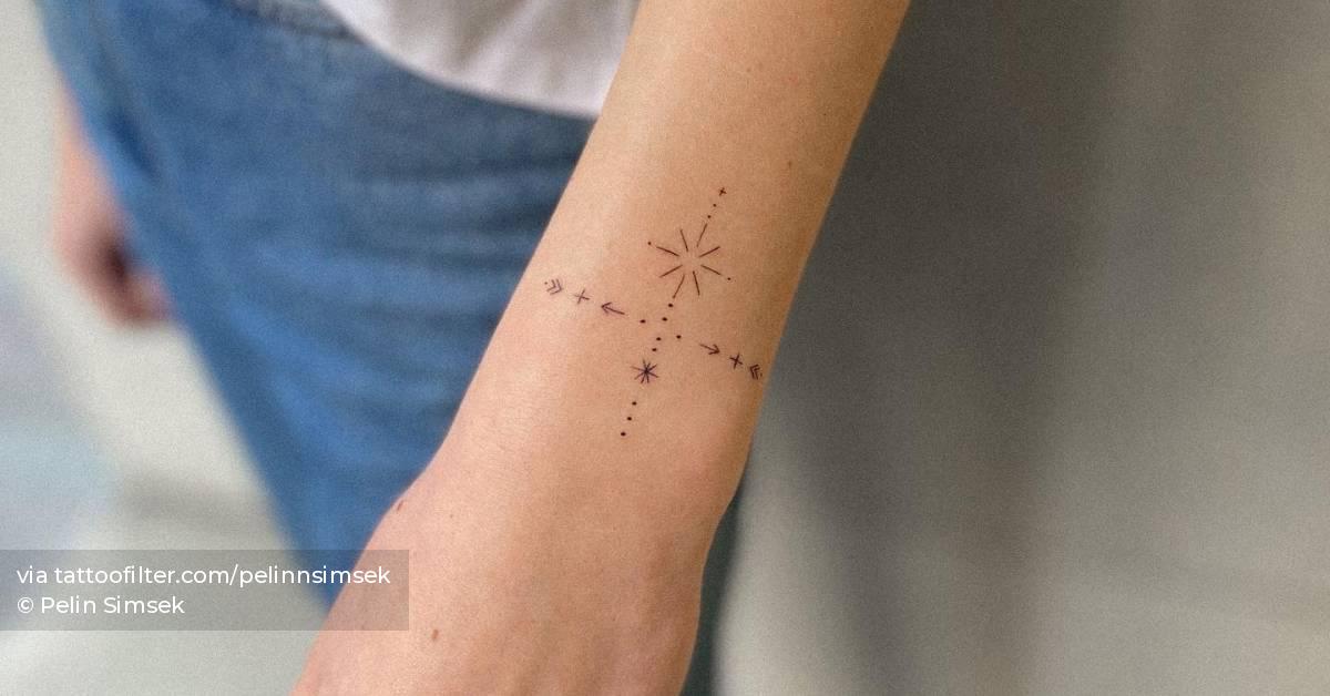 Fine line star ornament tattoo done on the wrist.