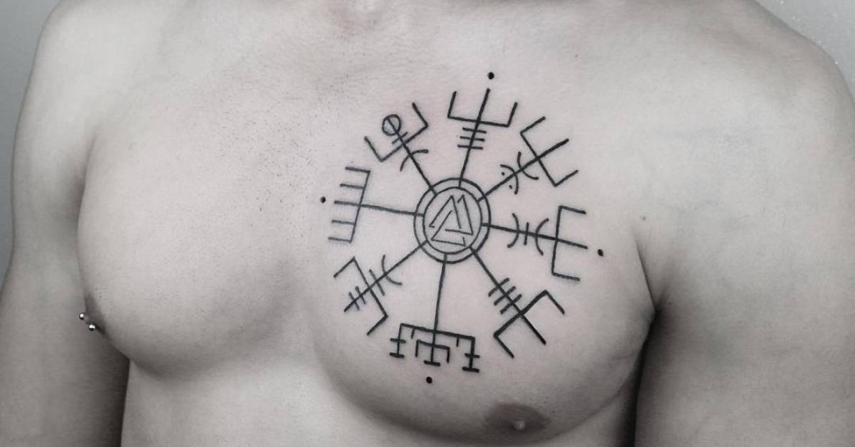 Vegvísir and Valknut tattoo done on the chest.