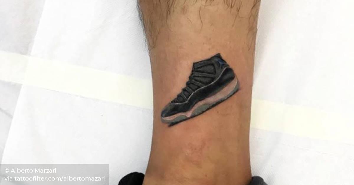 Air Jordan Retro 11 Space Jam tattoo.