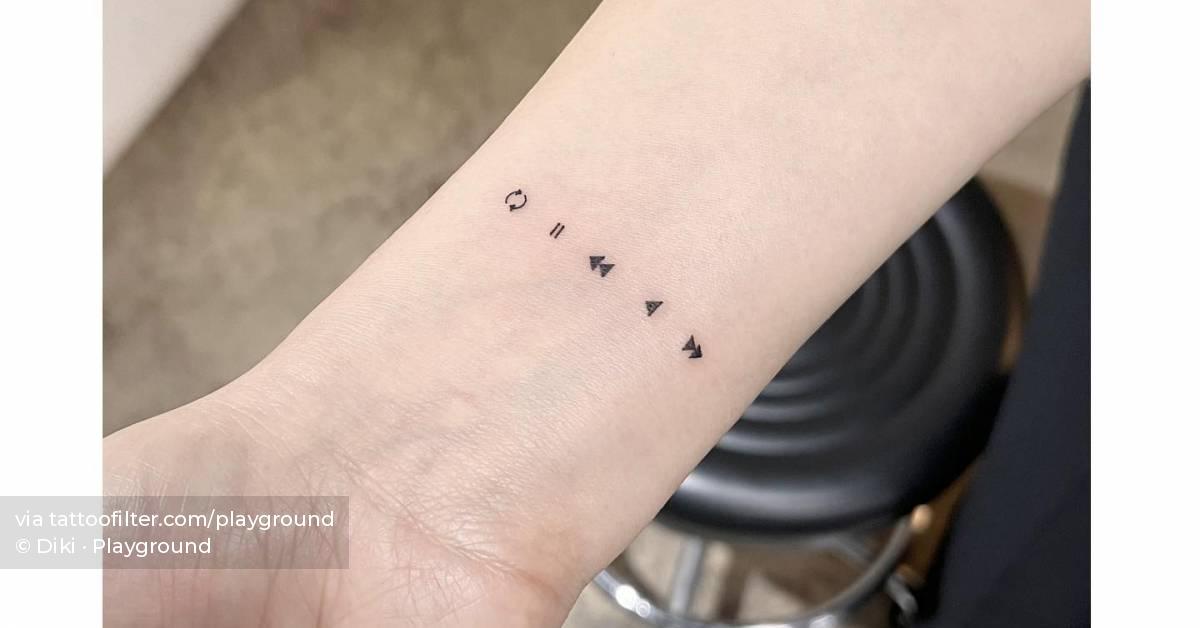 Minimalistic style music media controls tattooed on the