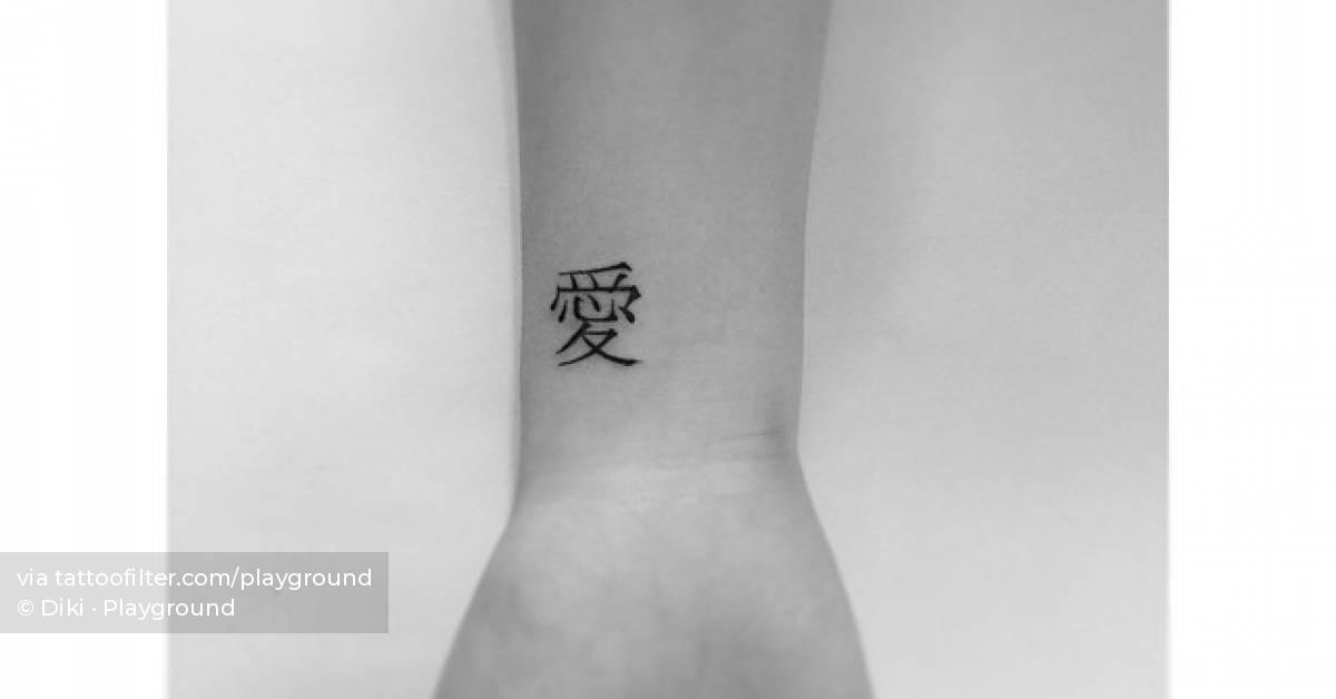 Chinese character tattooed on the wrist.