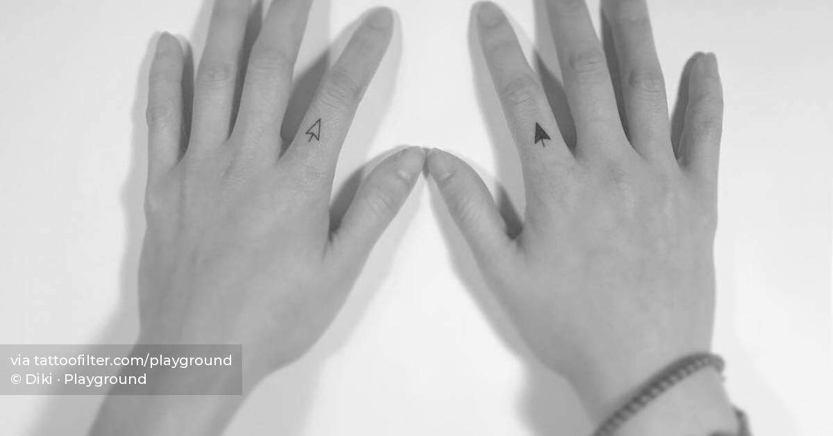 Individual matching cursor pointer tattoo done on the