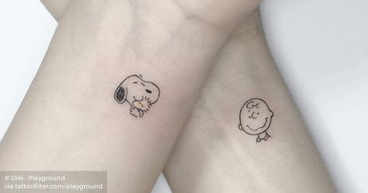 Matching Snoopy and Charlie Brown tattoo.