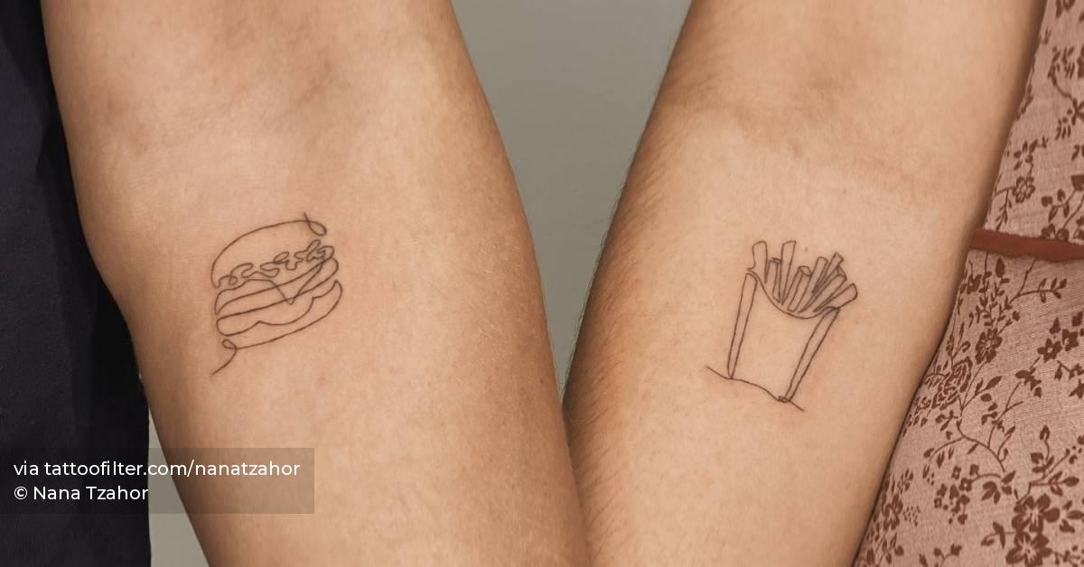 Matching burger and fries tattoo for couple, done in