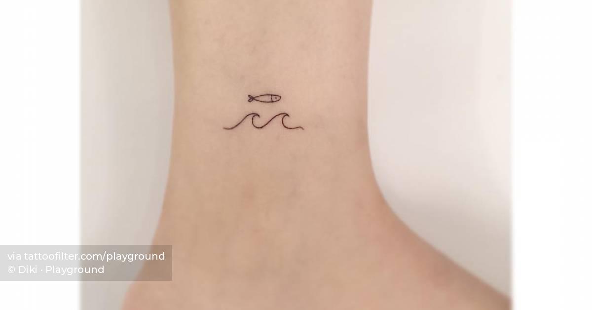 Minimalistic style wave and fish tattoo done on the