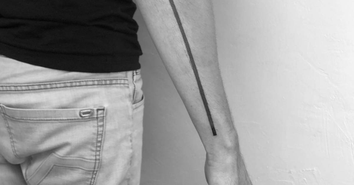 Tattoo of a line done on the forearm, minimalistic