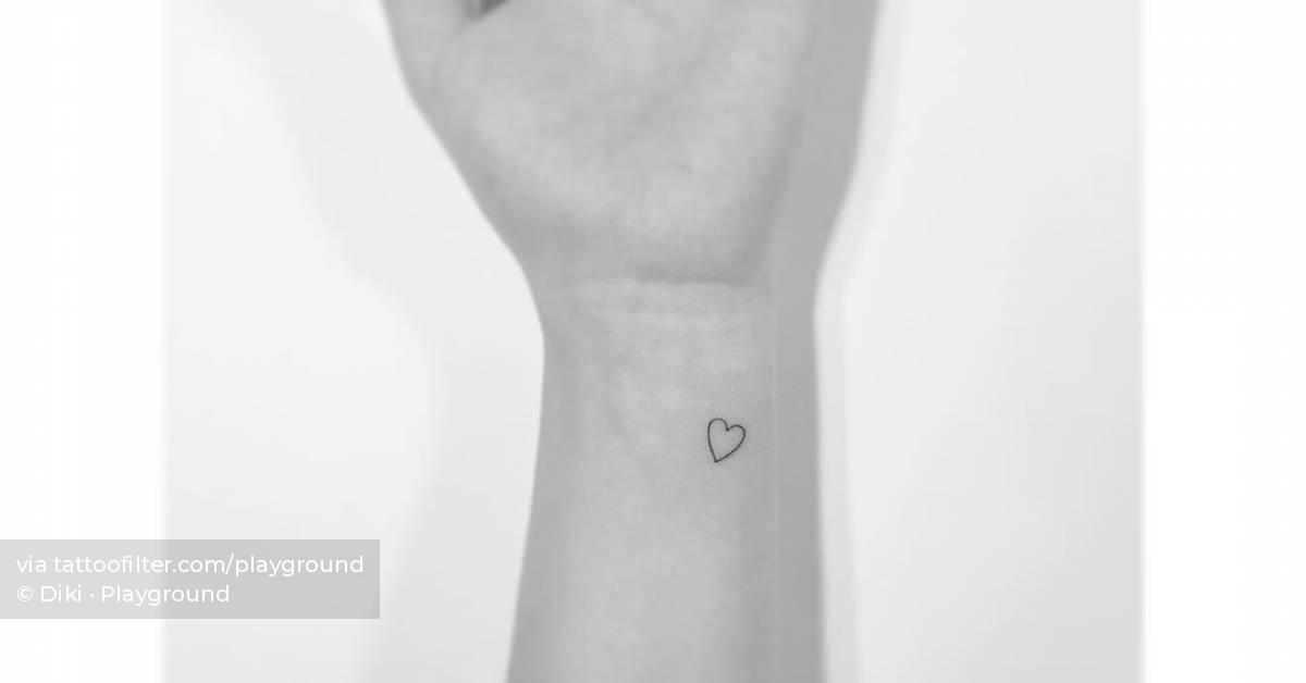 Simple heart tattoo done on the wrist, minimalistic
