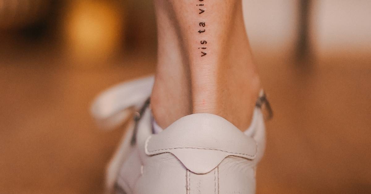Tattoo that says "vis ta vie"⁠ located on the