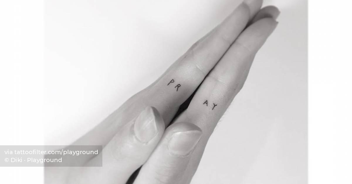 Individual matching tattoo of the word "pray" done on