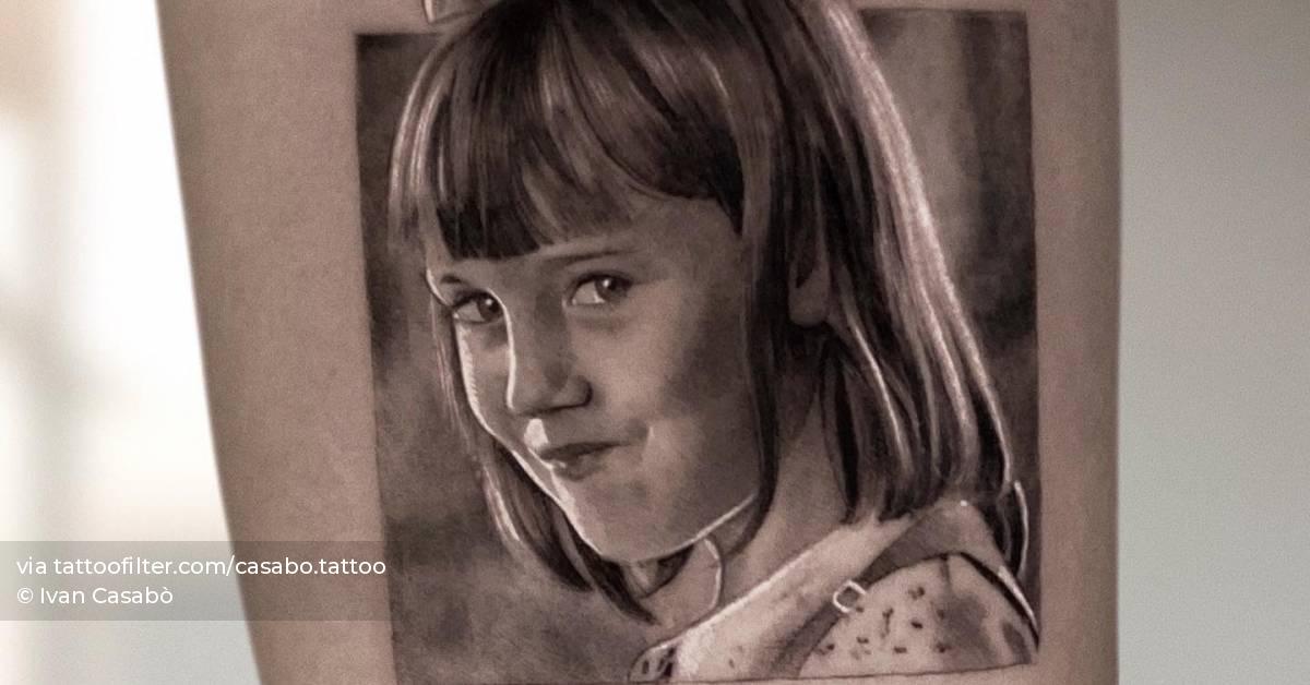 Black and grey Matilda portrait tattoo located on the