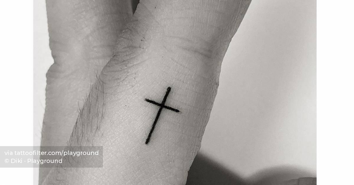 Thumb Cross Tattoos