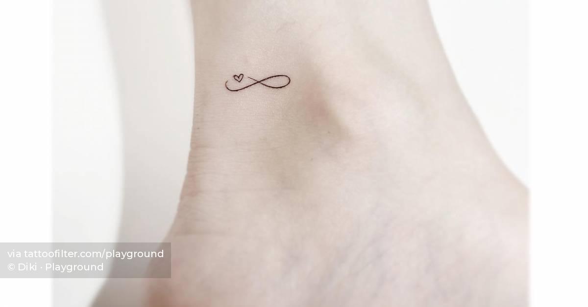 Minimalistic infinity symbol and heart tattoo done on