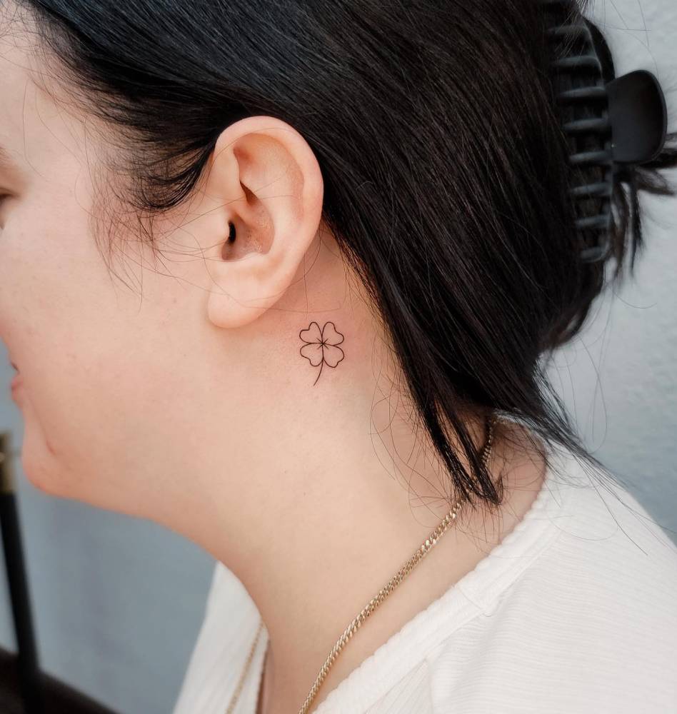 Fine Line Four Leaf Clover Tattoo Done On The Neck 