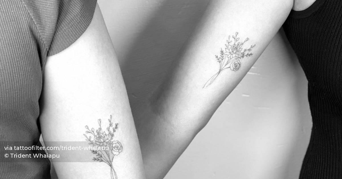 Matching fine line flower bouquet tattoo for couple.
