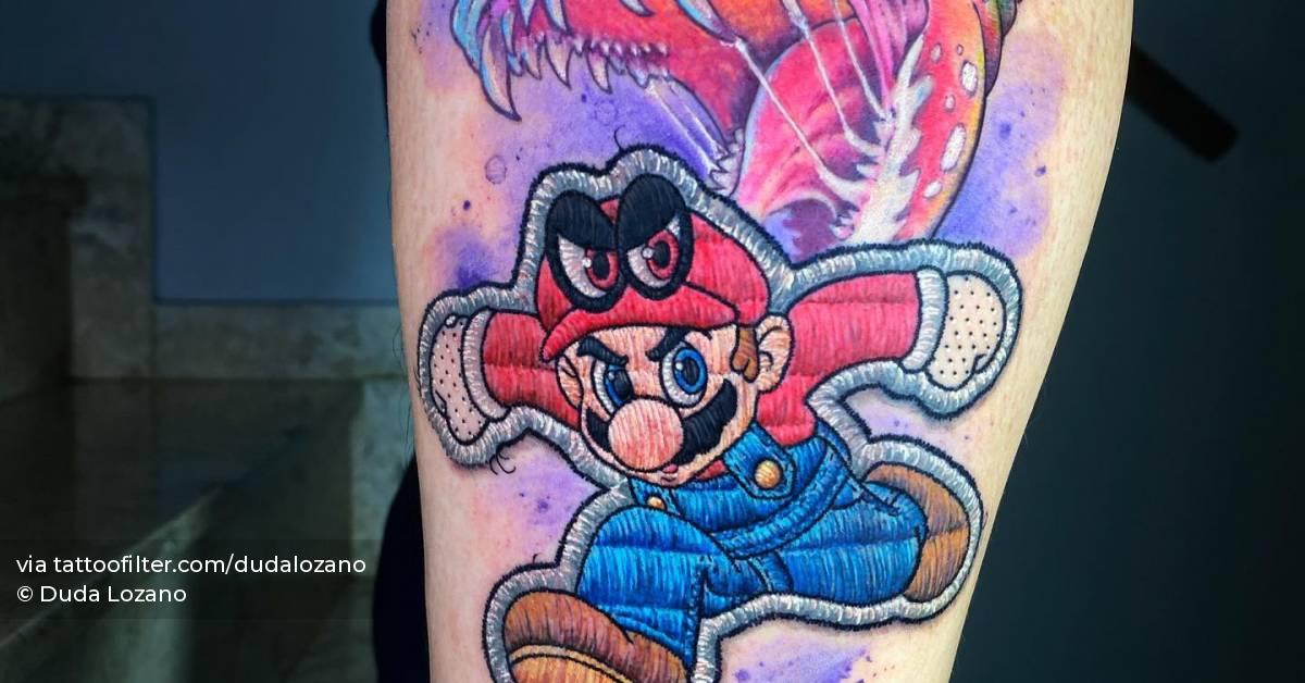 Super Mario themed tattoo located on the shin.