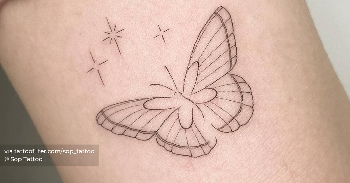 Tattoo of a butterfly in fine line done on the inner