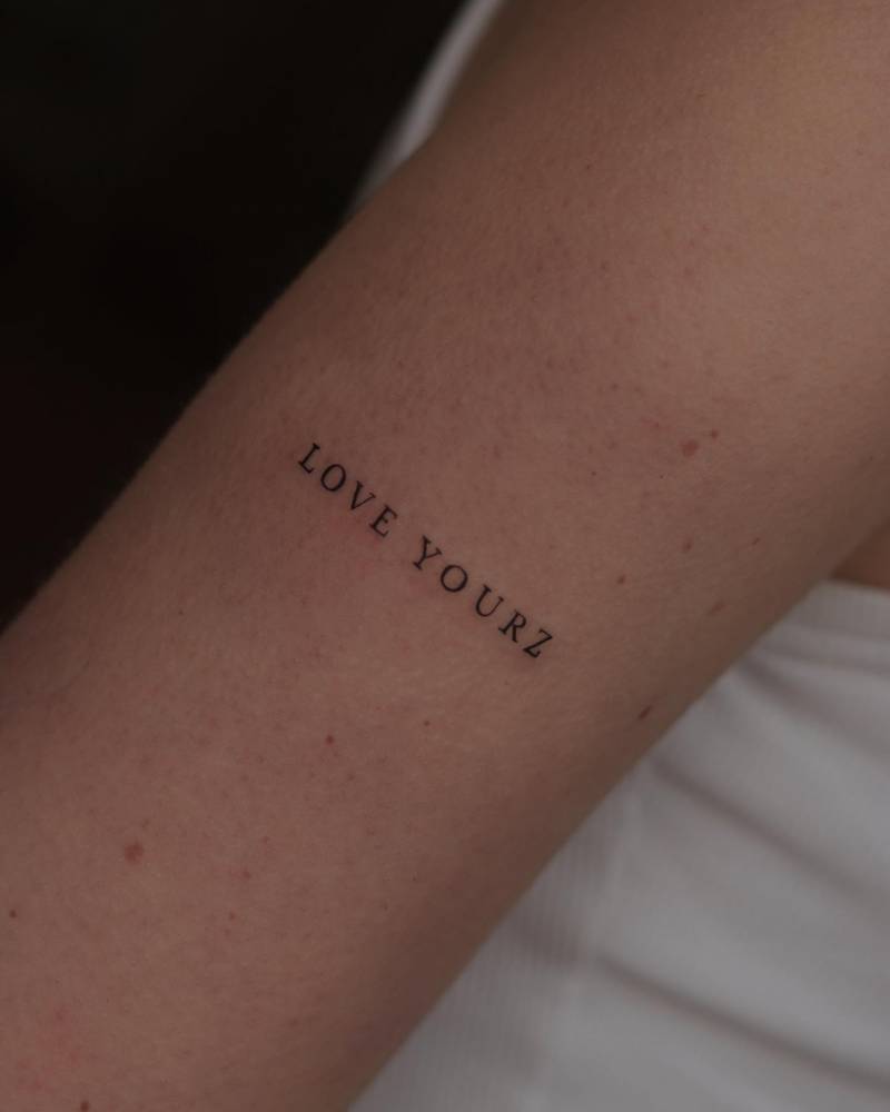  Love Yourz Lettering Tattoo Located On The Upper Arm 