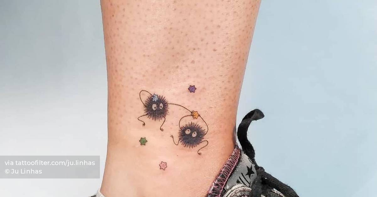 Soot sprites tattooed on the ankle.