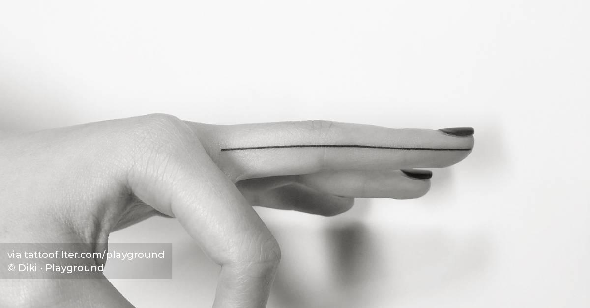Minimalistic line tattoo located on the finger.