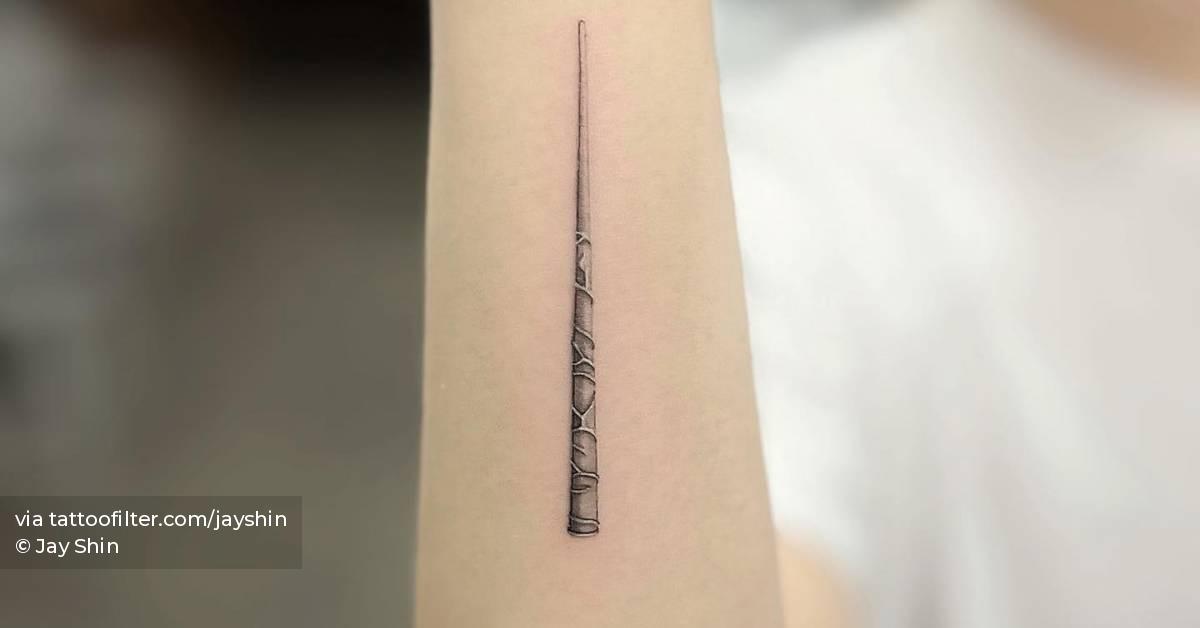 Hermione's wand tattooed on the wrist, micro-realistic