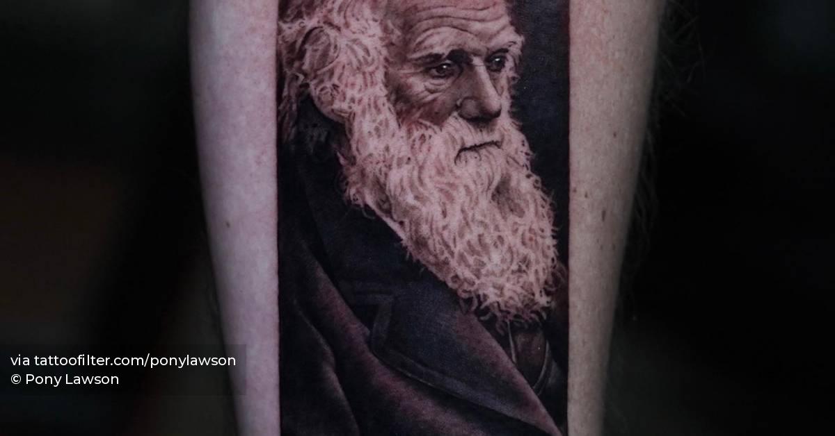 Micro-realistic style Charles Darwin portrait tattoo