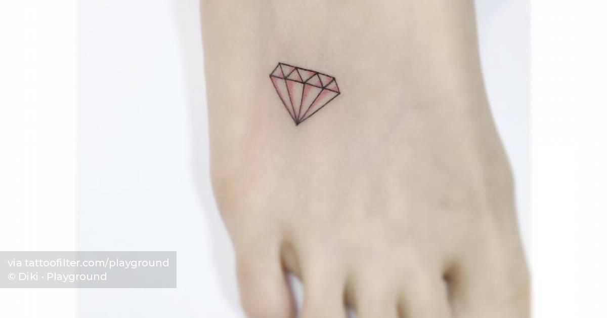 Diamond tattoo located on the foot.