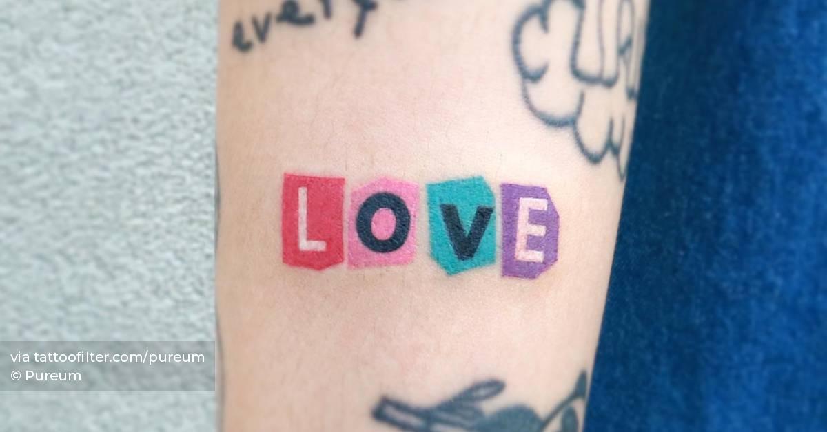 Tattoo of the word "love" located on the forearm,