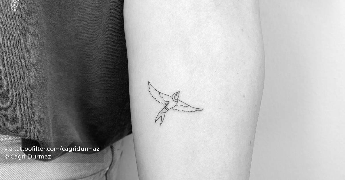 Fine line swallow tattoo done on the inner forearm.